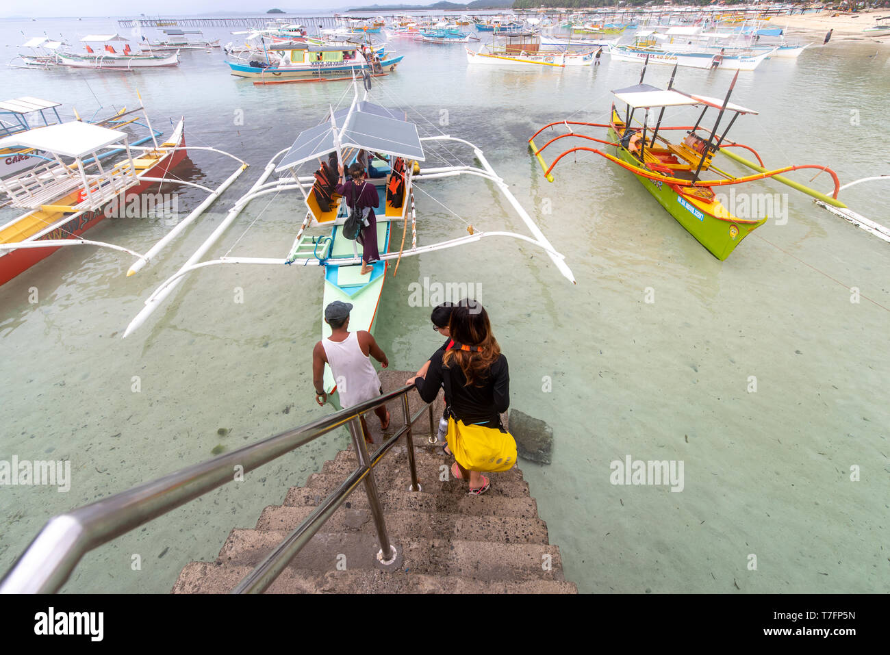 Apr 29, 2019 Tourists on a boat to tour in the General Luna port ...