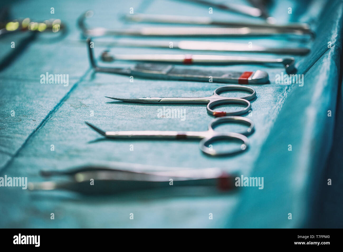 Set of sterile instruments laid out on the table for an operation on a ...