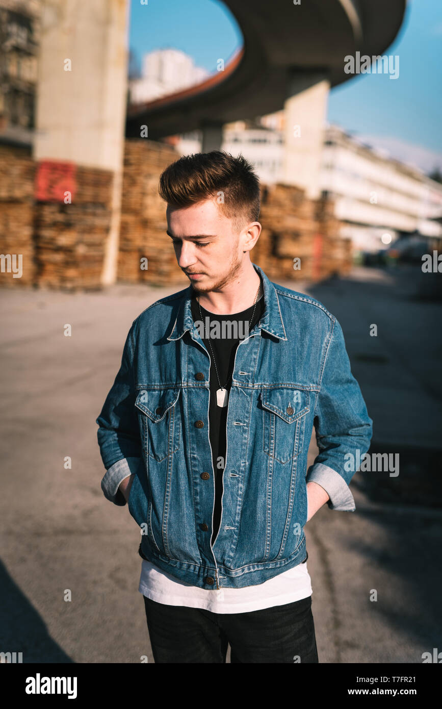 Urban young man posing Stock Photo - Alamy