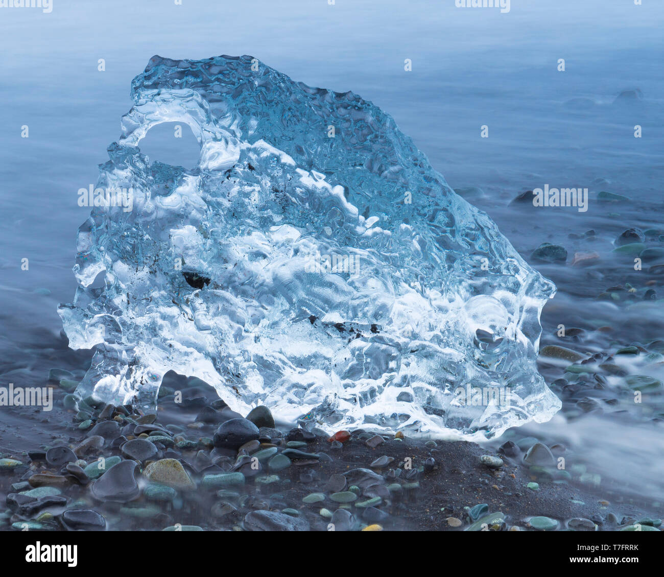 Diamond Beach, piece of ice among pebbles on the beach Stock Photo - Alamy