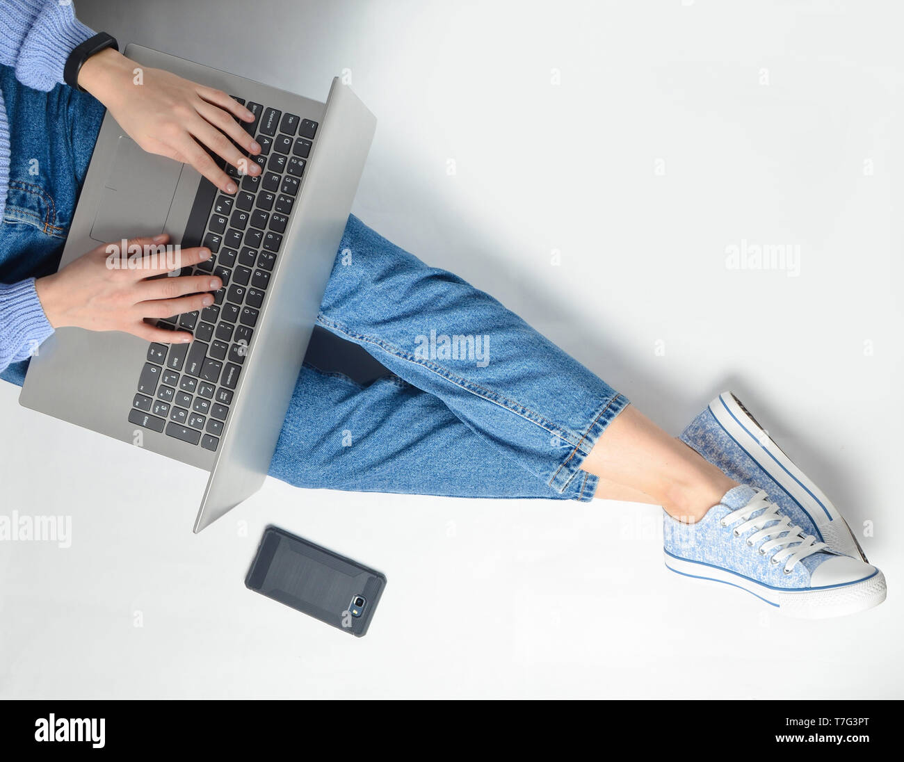 The concept of blogging, working on a laptop. Using a laptop sitting on ...