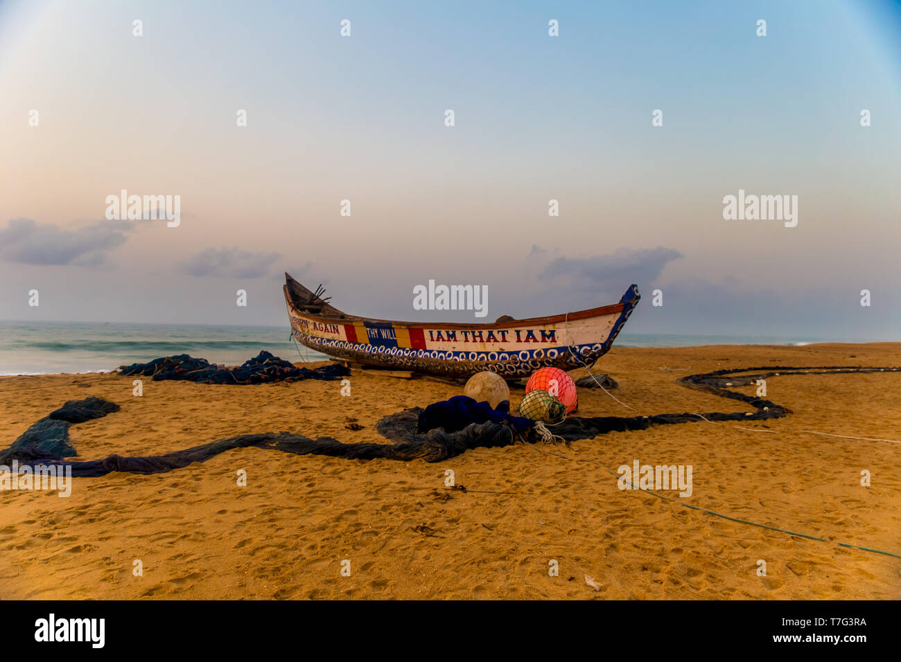 A fishing boat on a beach in Ouidah, Benin Republic Stock Photo - Alamy