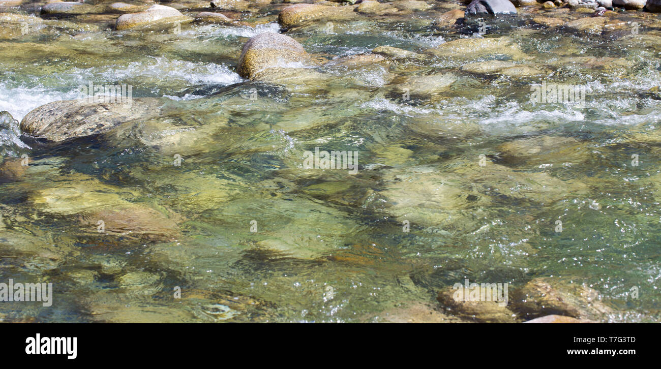 Water in the mountain raging river. Beautiful natural background of ...