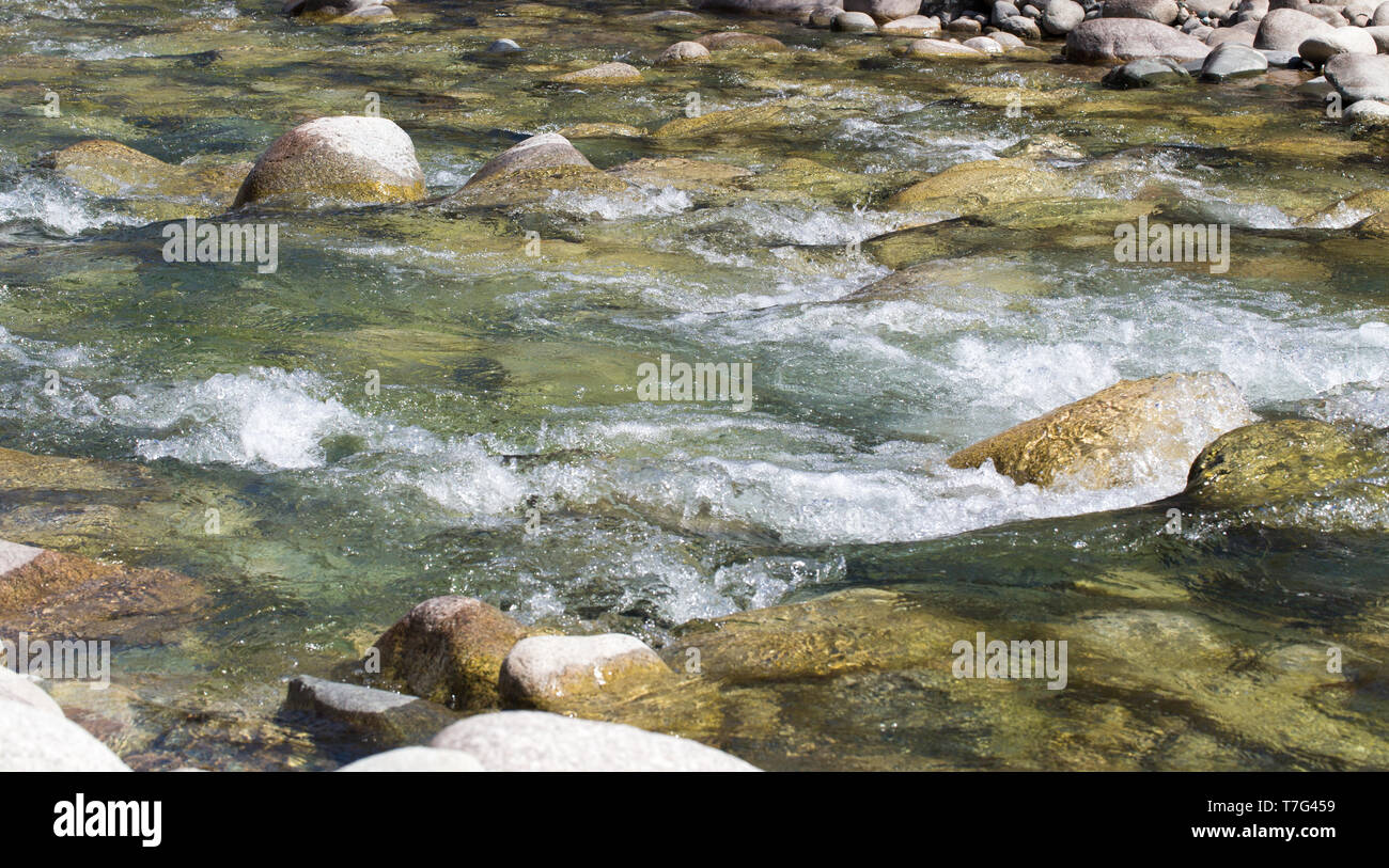 Water in the mountain raging river. Beautiful natural background of ...
