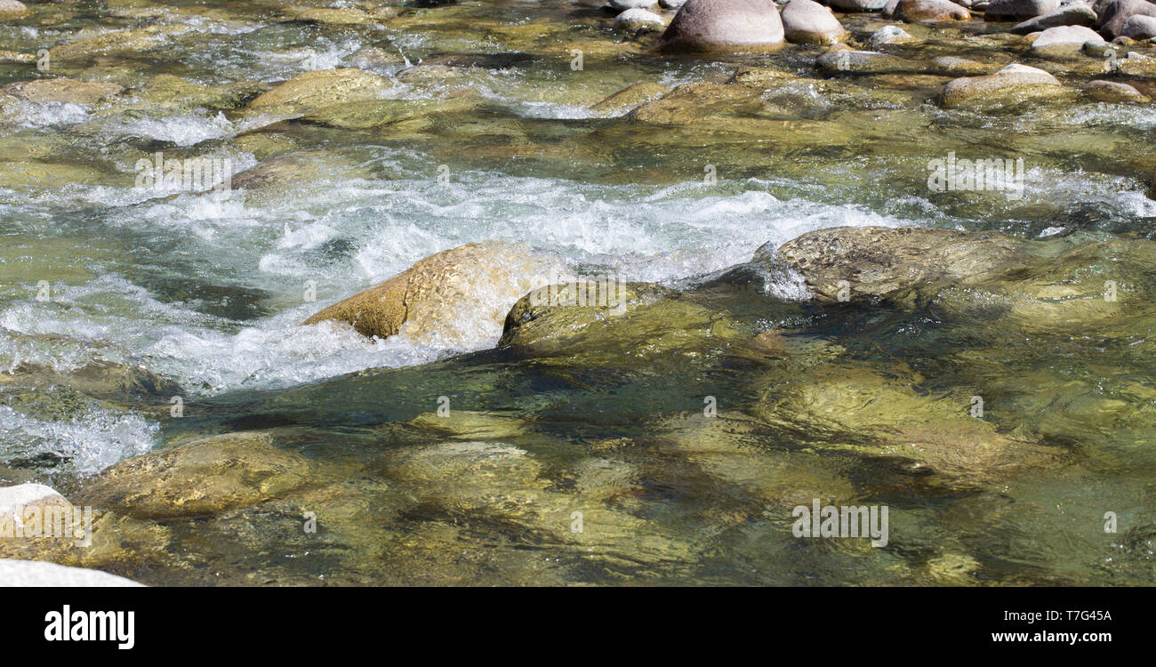 Water in the mountain raging river. Beautiful natural background of ...