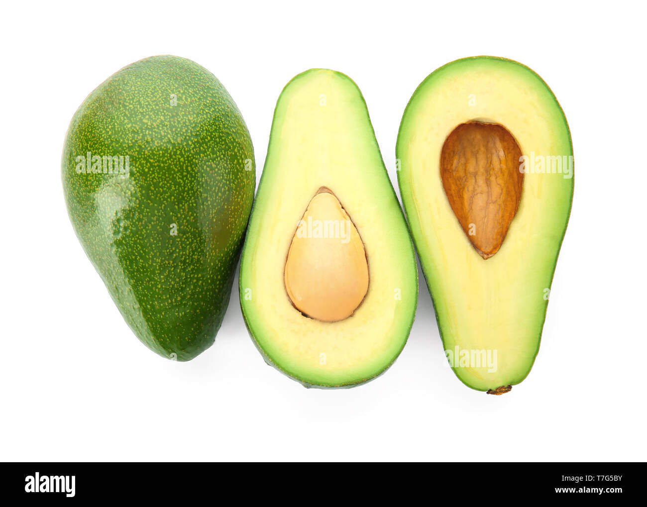Fresh avocados on white background Stock Photo - Alamy