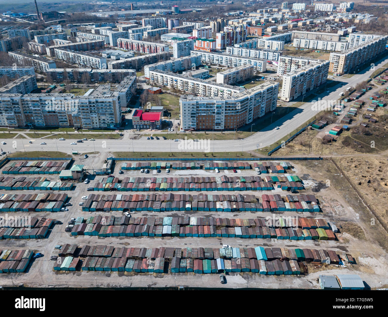 Aerial view of a large number of iron garages for cars with colored ...