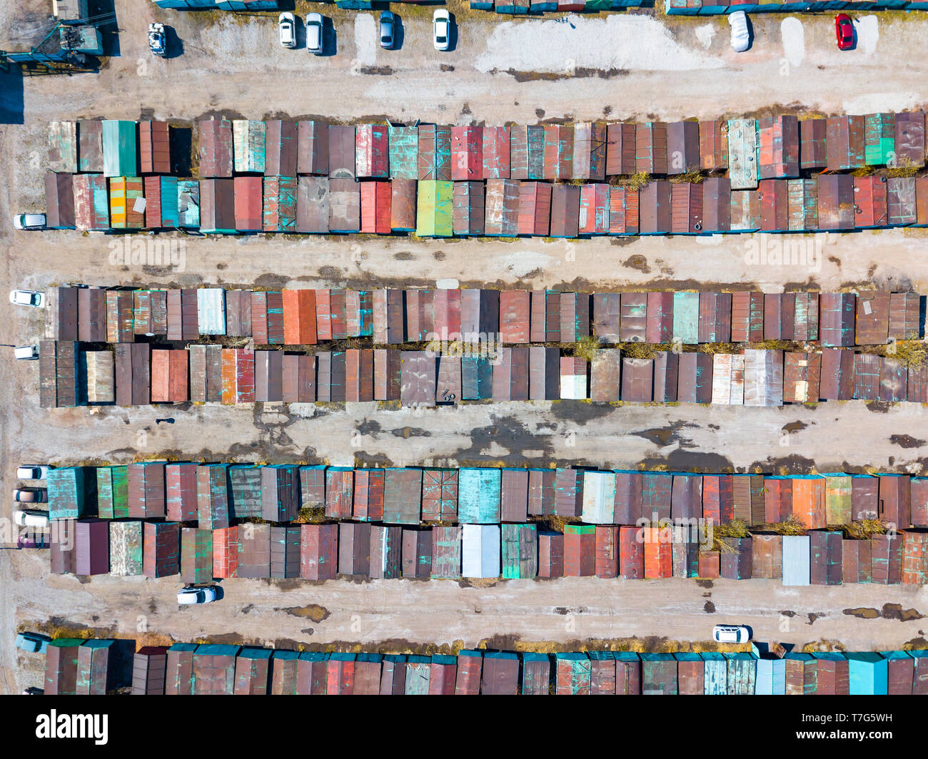 Aerial view of a large number of iron garages for cars with colored ...