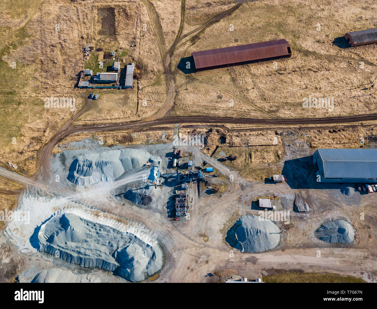 Aerial view of a small plant for the production and cleaning rubble and ...