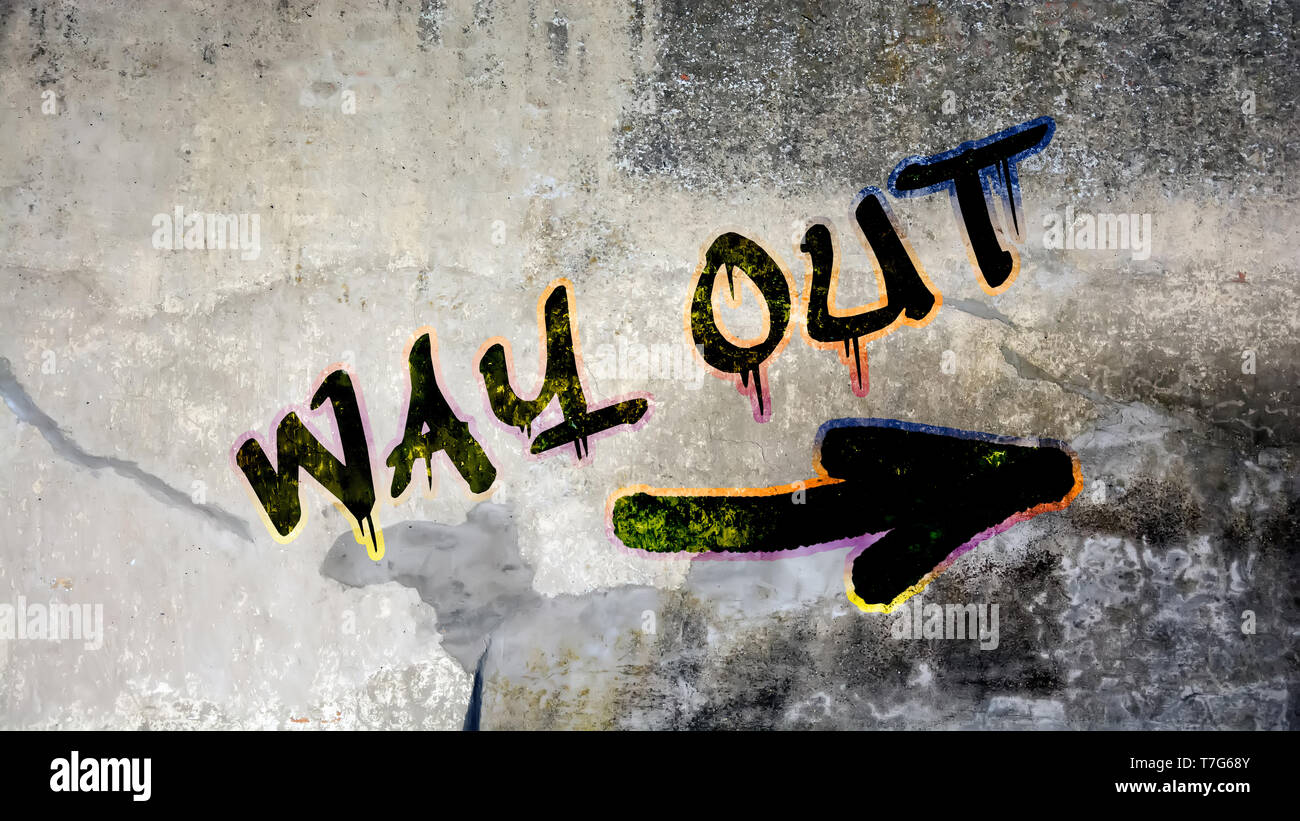Wall Graffiti the Direction Way to WAY OUT Stock Photo - Alamy