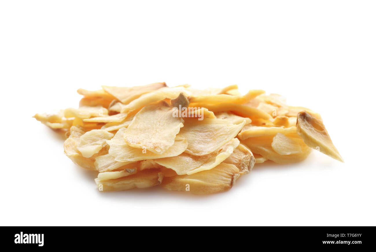Dried garlic flakes on white background Stock Photo - Alamy