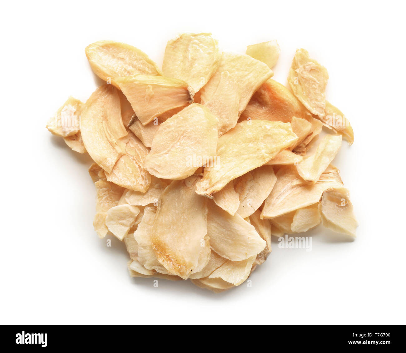 Dried garlic flakes on white background Stock Photo - Alamy