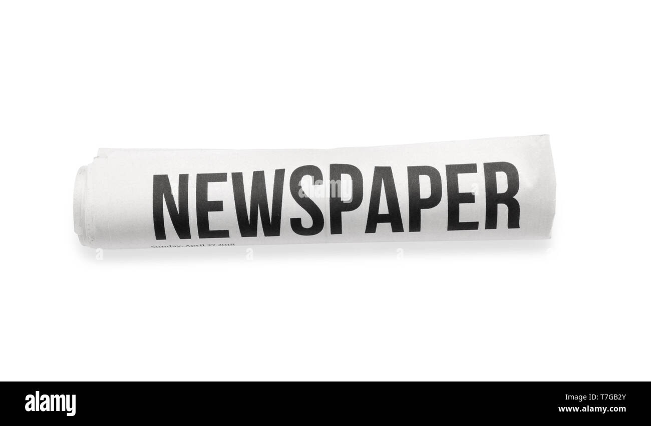 Rolled newspaper on white background Stock Photo - Alamy