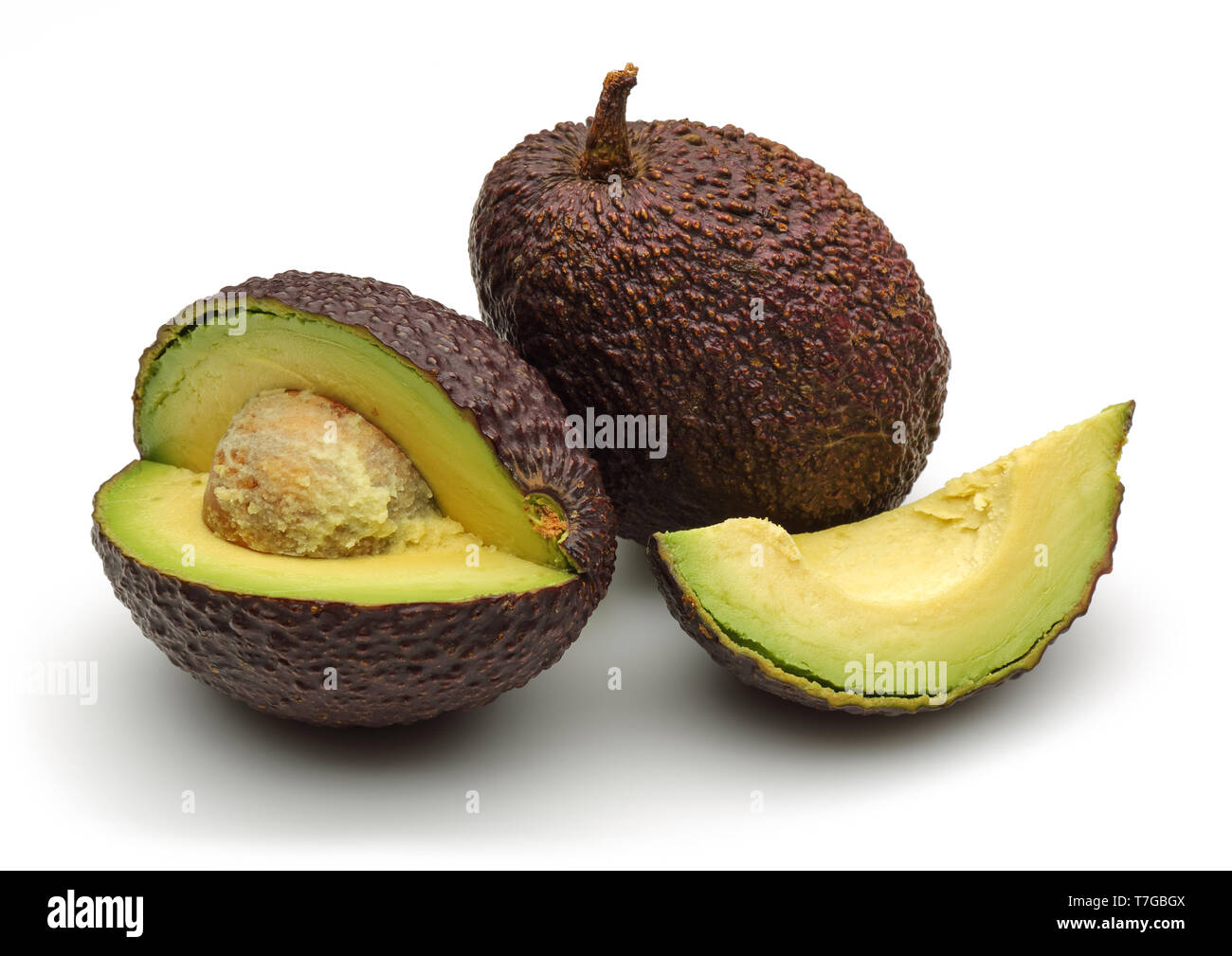 Fresh ripe avocado with slices isolated on white background Stock Photo ...