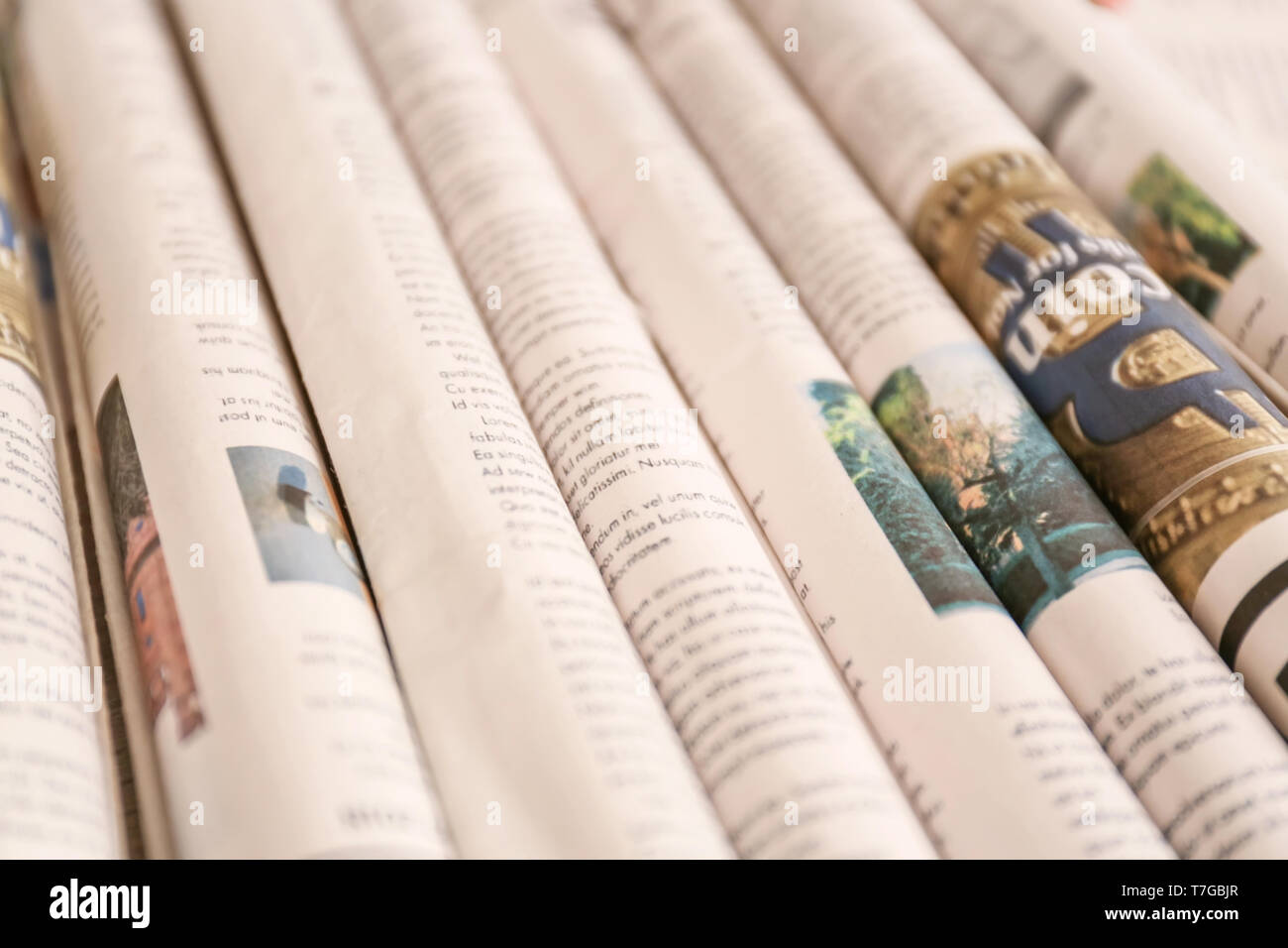 Rolled newspapers hi-res stock photography and images - Alamy