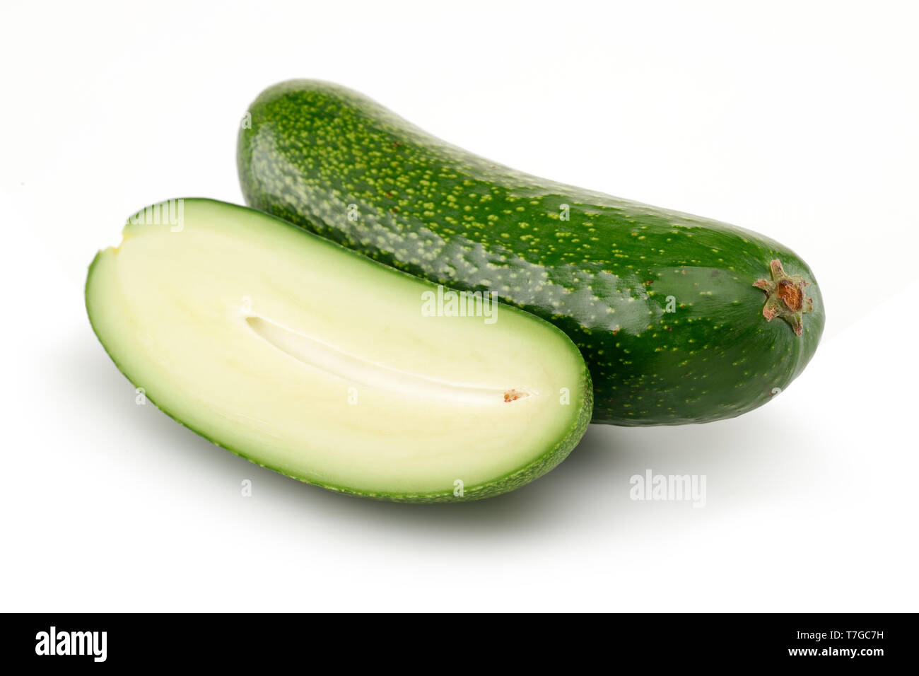 Fresh seedless avocados isolated on white background Stock Photo - Alamy