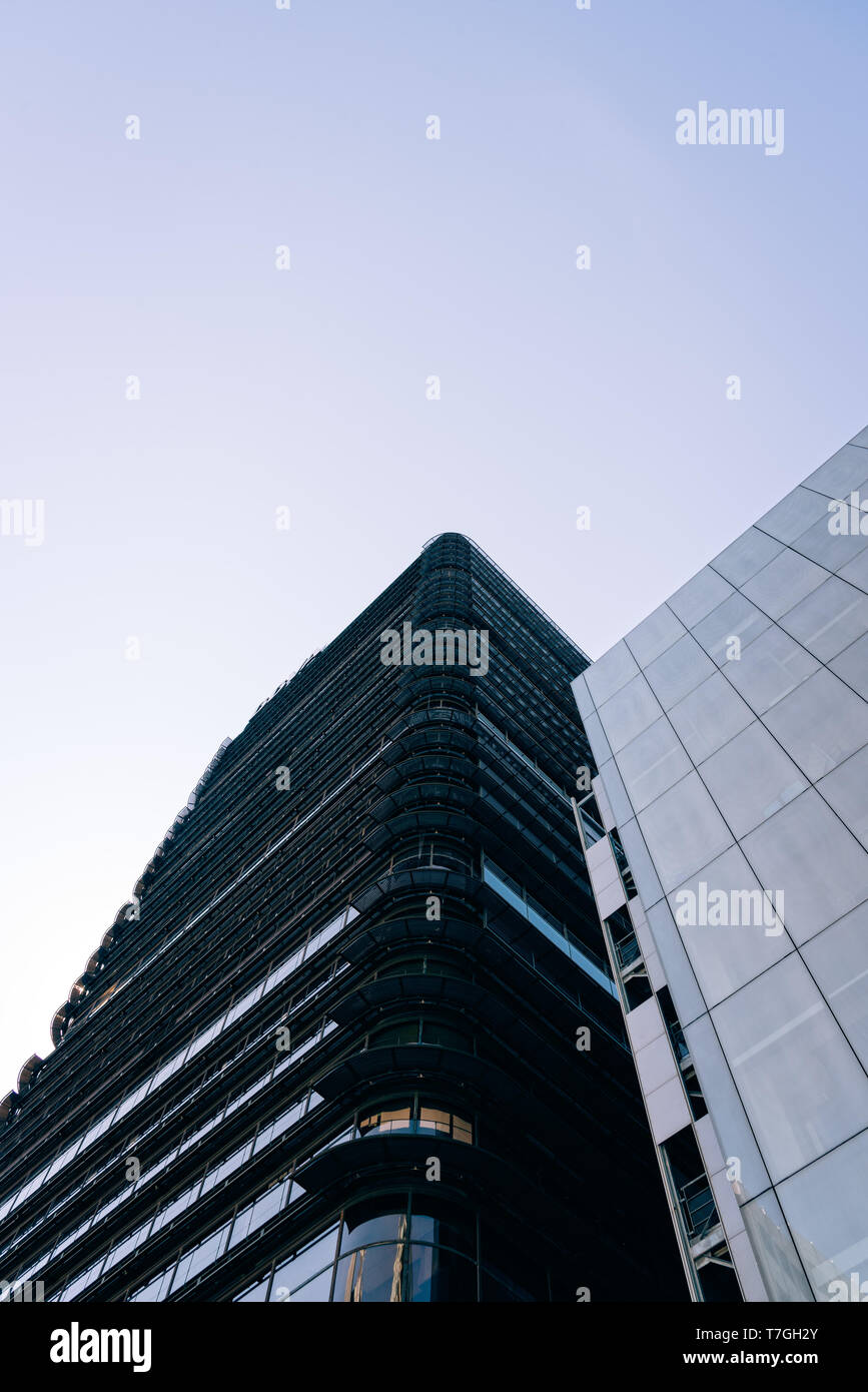 Madrid, Spain - May 1, 2019: Low angle view of Modern skyscraper in ...