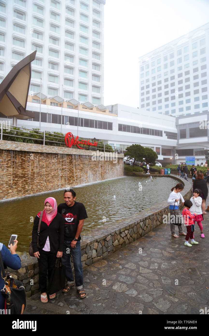 Tourist taking photo with Genting Highland landmark building, the ...
