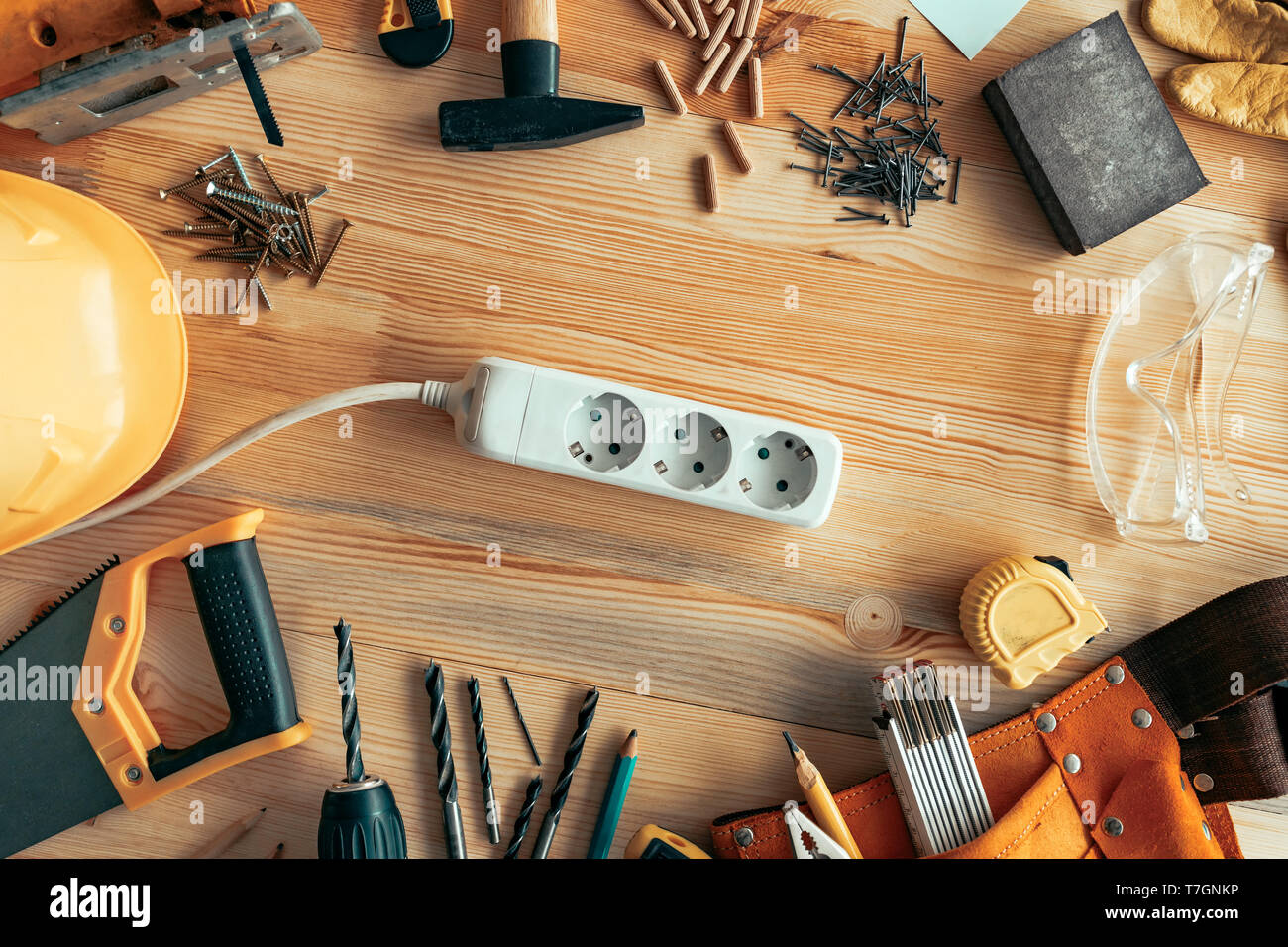 Power strip extension cord on carpentry woodwork woodwork desk, top ...