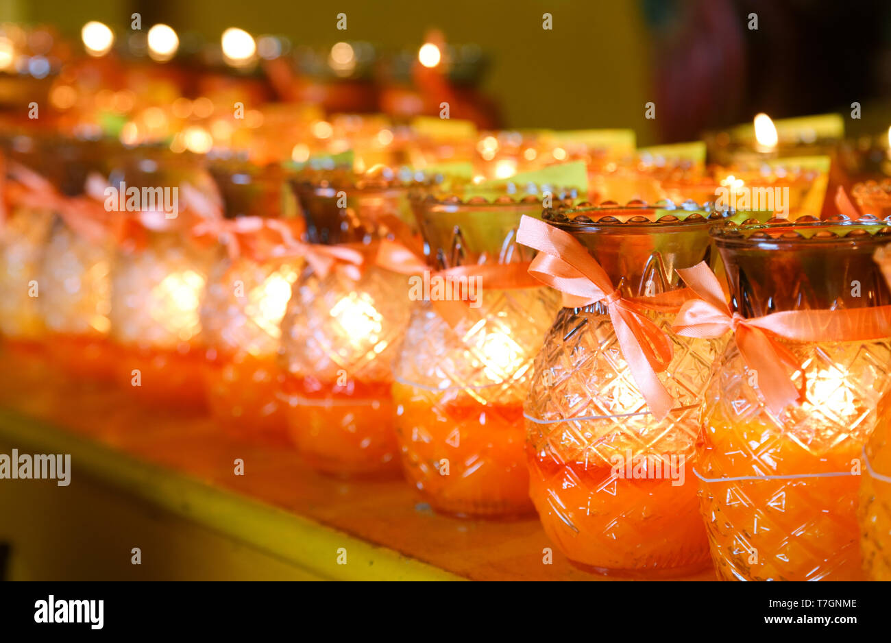 Candle jar offering in a taoist chinese temple Stock Photo - Alamy
