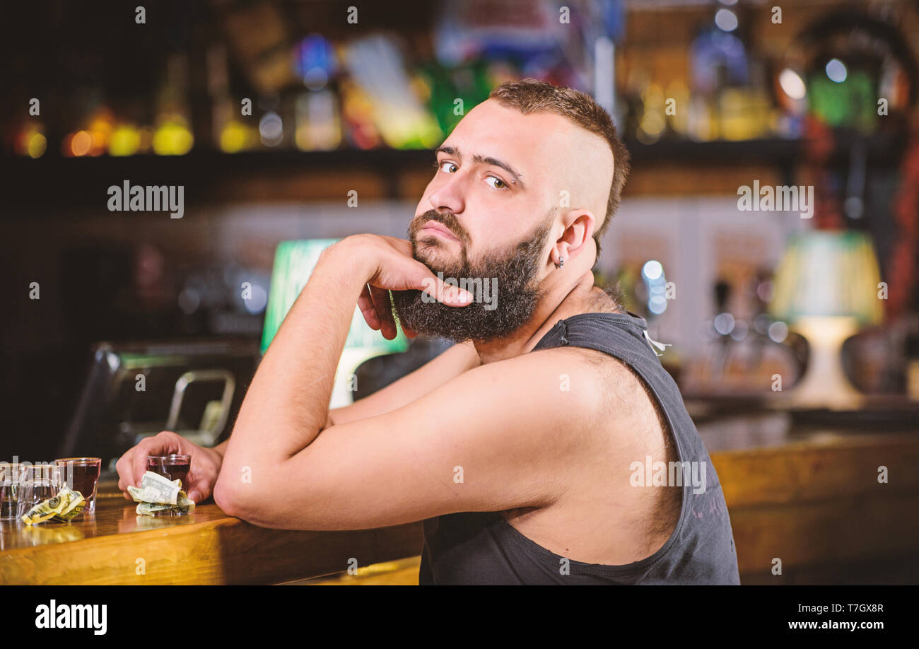 Alcoholism and depression. Alcohol addicted concept. Hipster brutal man ...