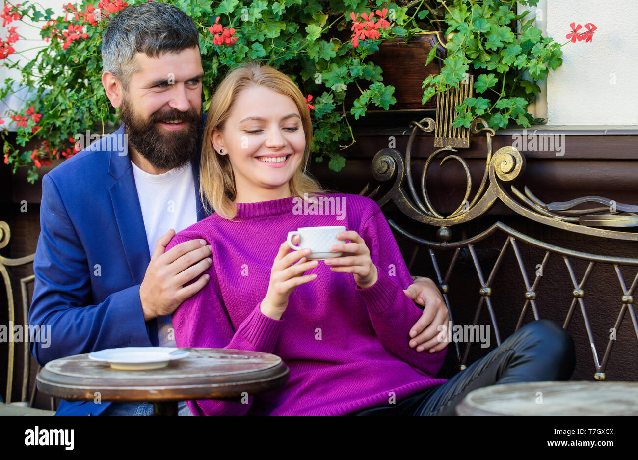 Couple cuddling in cafe girl hi-res stock photography and images - Alamy