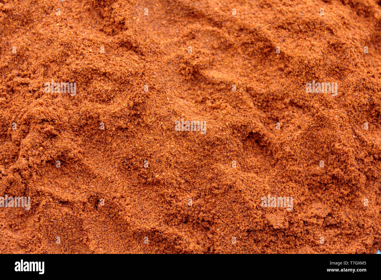 Cayenne pepper powder texture background pattern Stock Photo - Alamy