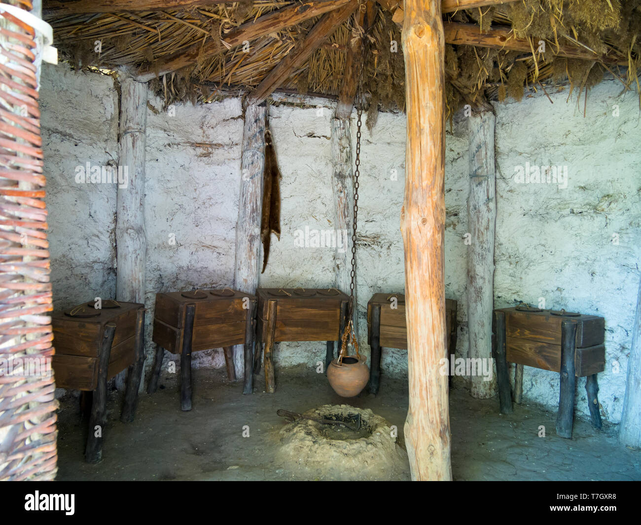 Interior of an ancient settlement hut, archaeological park "From nomads ...