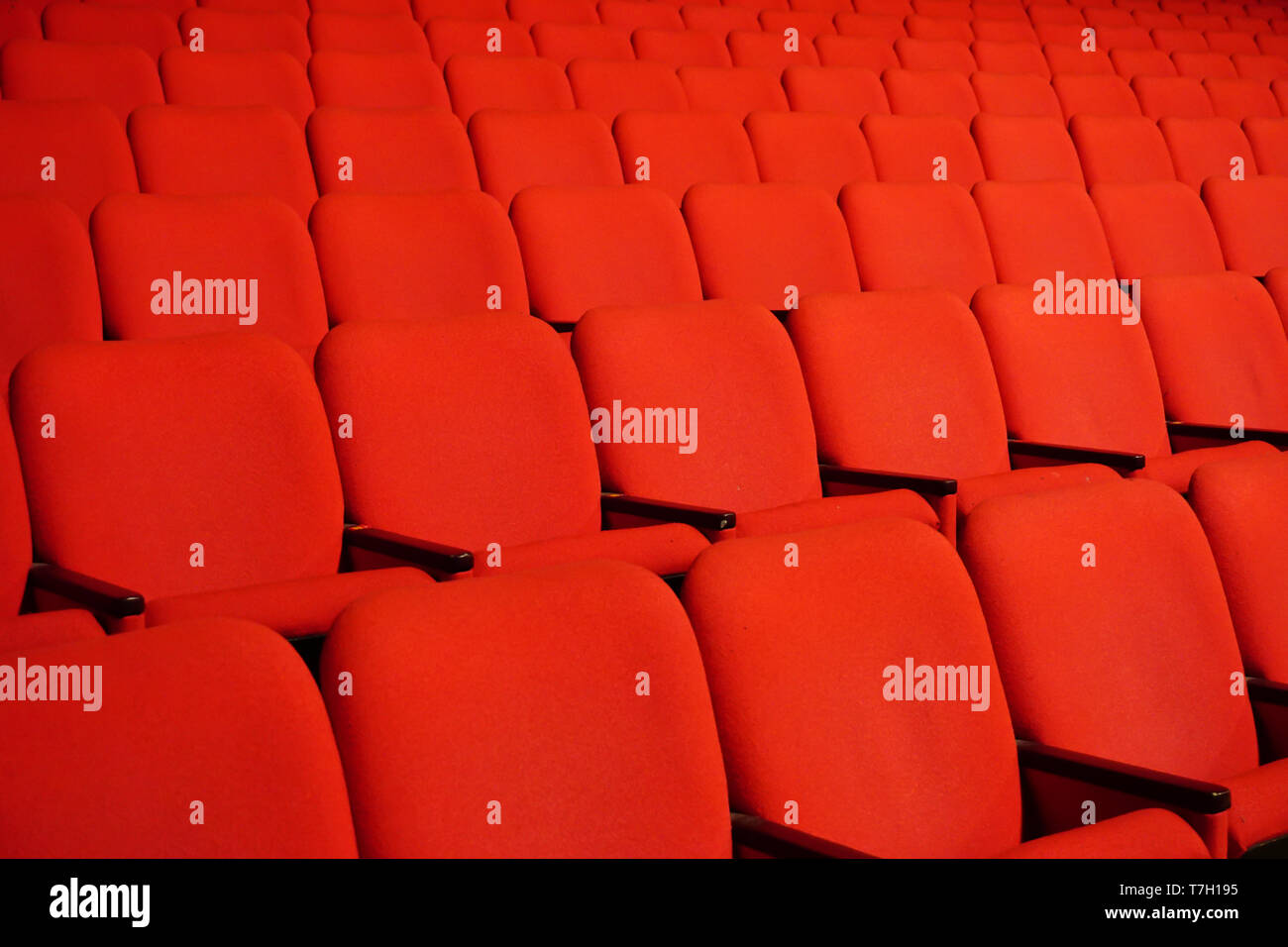 Red theater seats in a row Stock Photo - Alamy