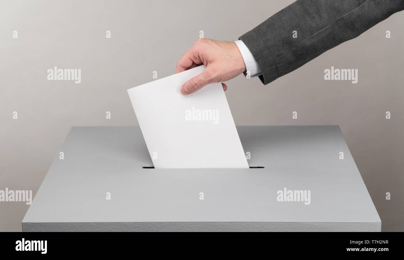 Gray ballot box. Presidential and parliamentary elections. The voter ...