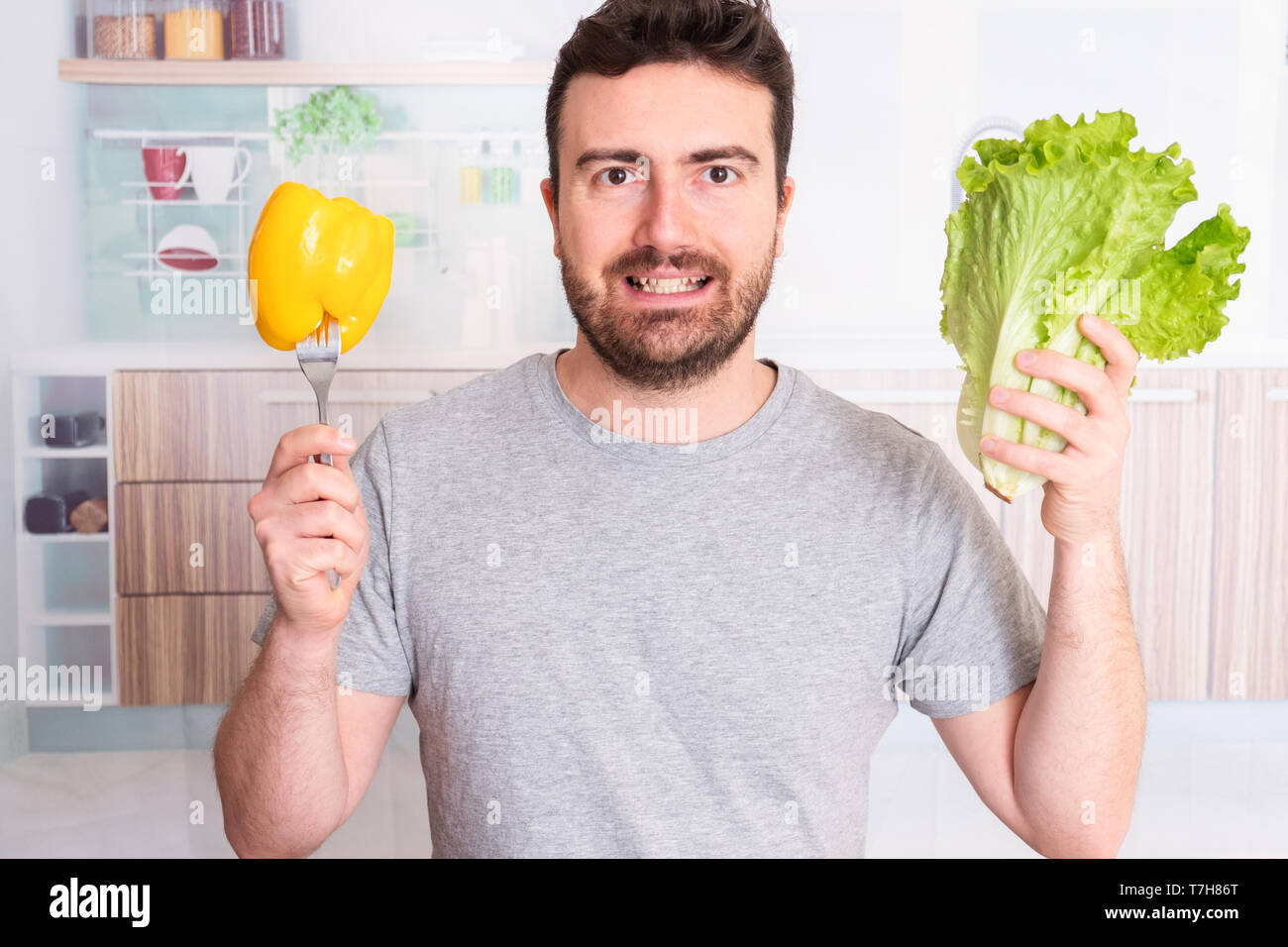 Handsome man eating healthy food hi-res stock photography and images ...