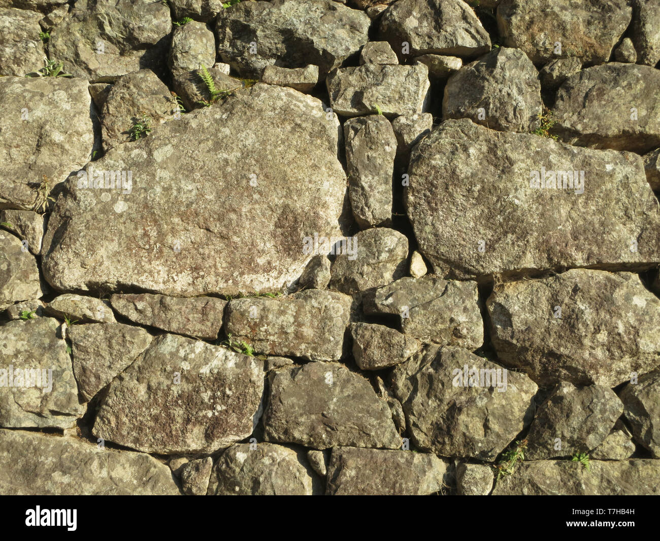 Foundations with rocks of Machu Picchu ruins in in the Cusco Region ...