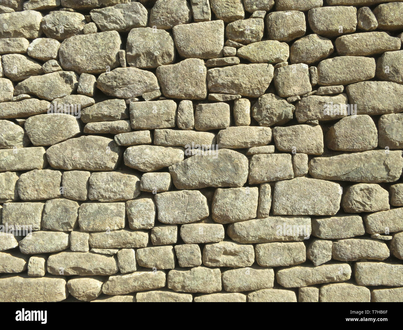 Wall with perfect rocks in Machu Picchu ruin in in the Cusco Region ...