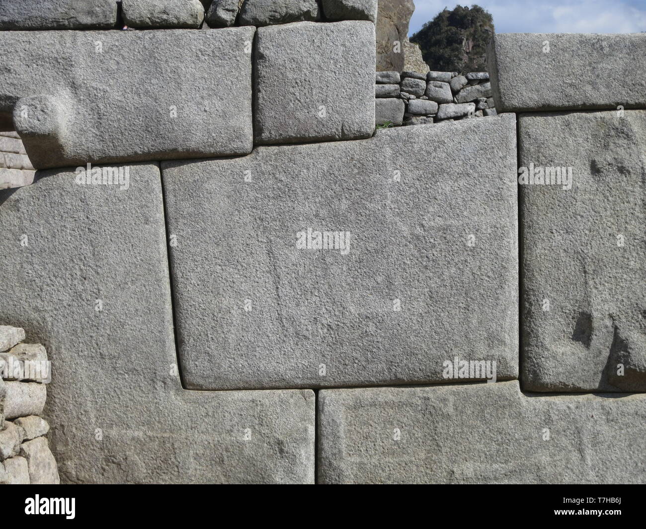 Perfect cut rocks in wall of a Machu Picchu ruin in the Cusco Region ...