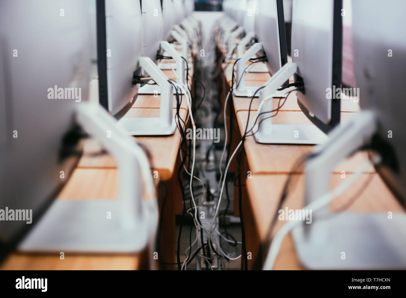 Row of computers classroom hi-res stock photography and images - Alamy