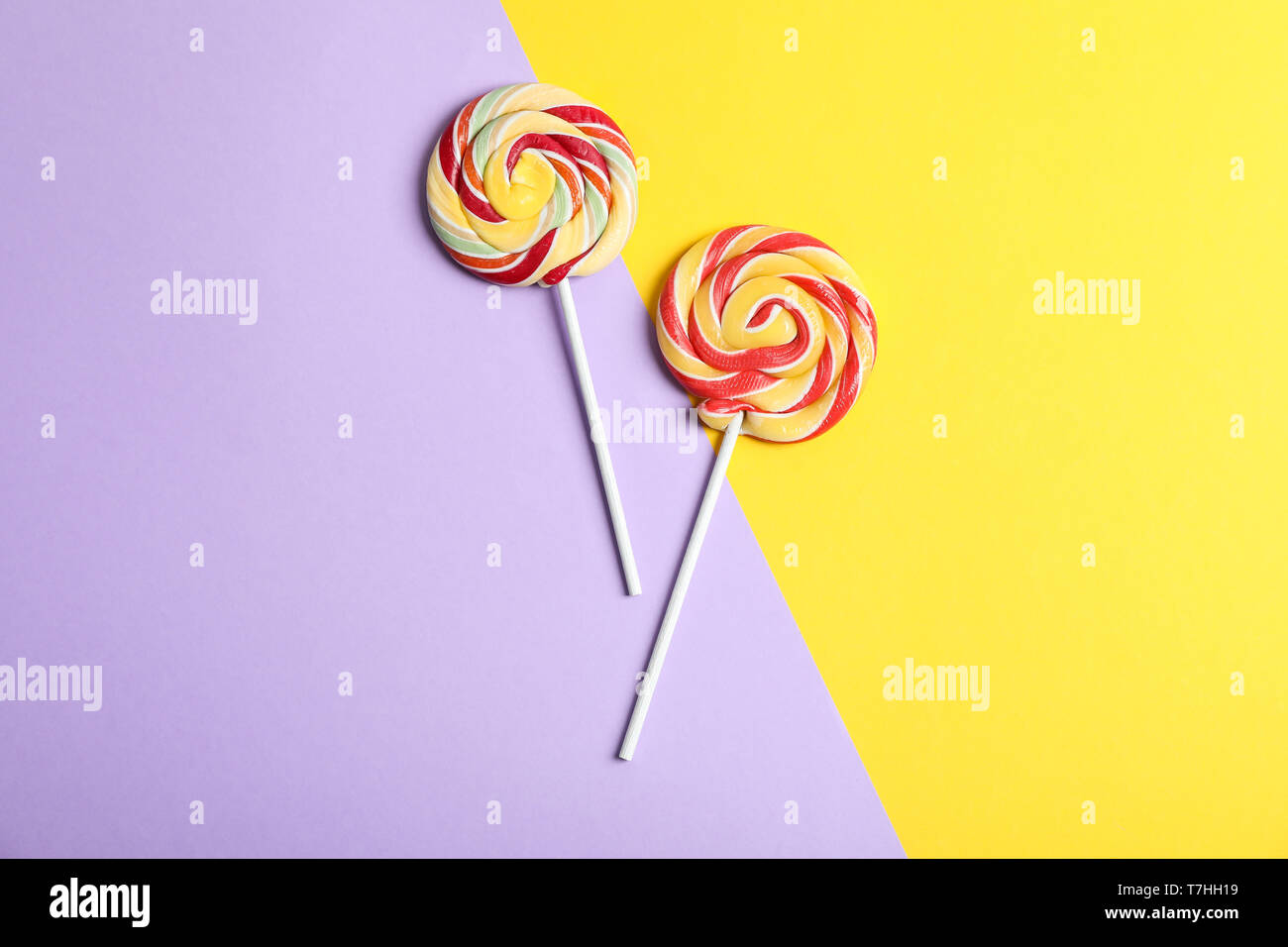 Sweet candies with space for text on two tone background Stock Photo ...