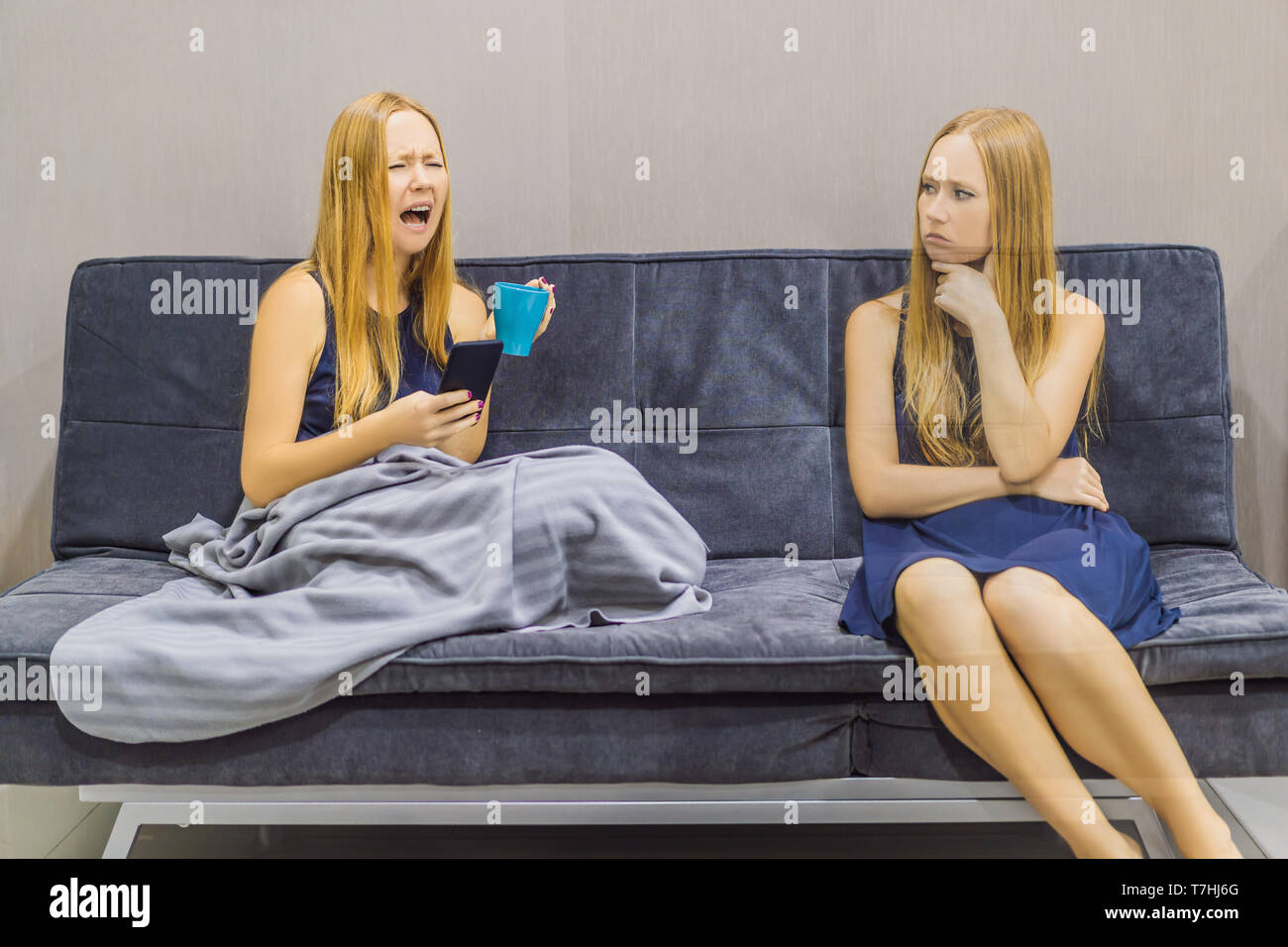 Woman experiencing sad emotions using a smartphone and evaluate their ...