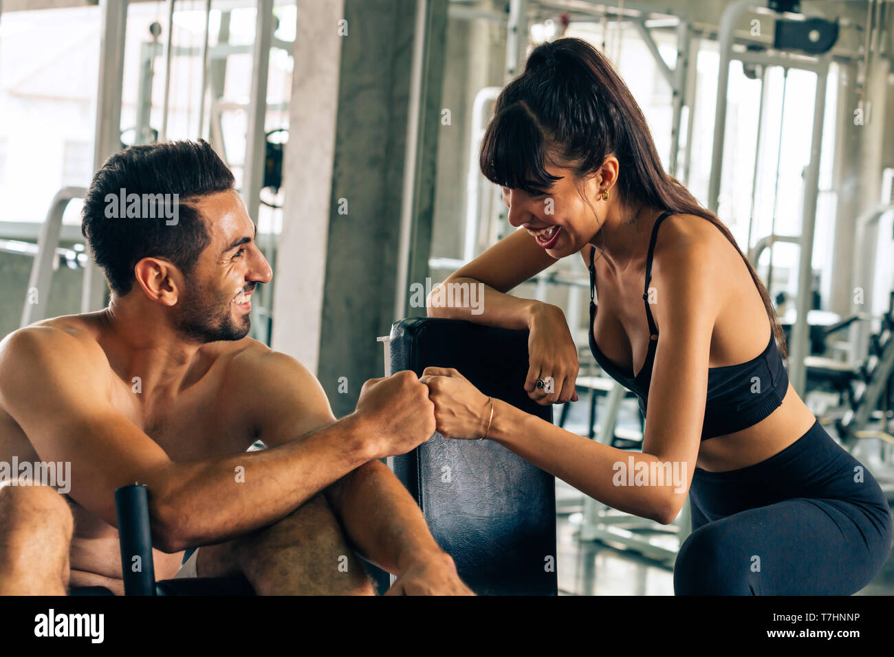 Two Young And Healthy Happy Smiling Caucasian Workout Buddies Doing