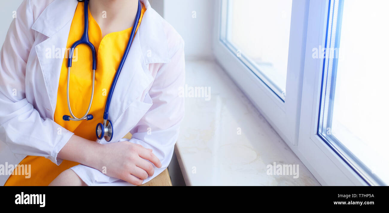 medicine. Female Doctor in the Hospital faceless background Stock Photo ...