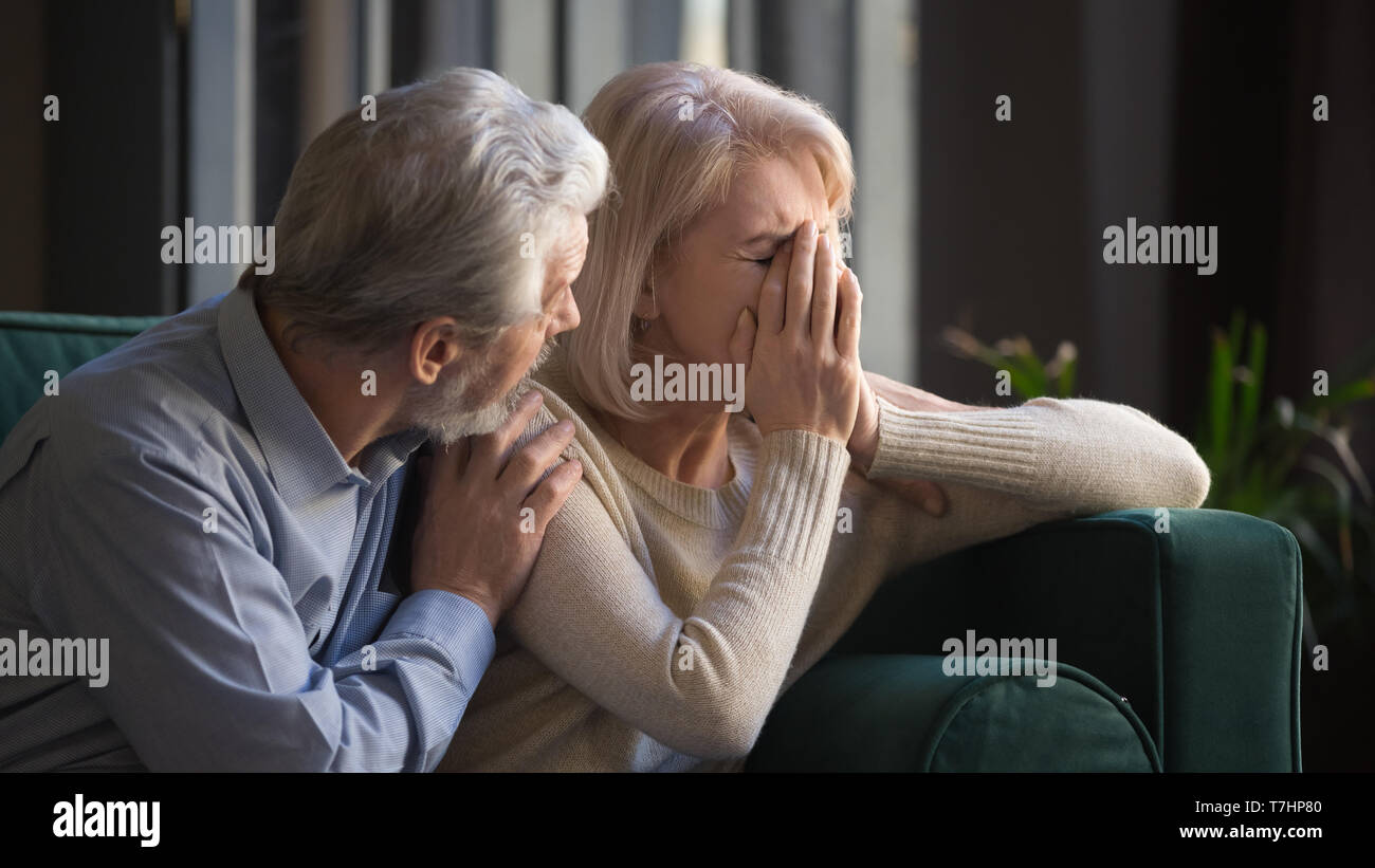 Elderly woman crying man hi-res stock photography and images - Alamy