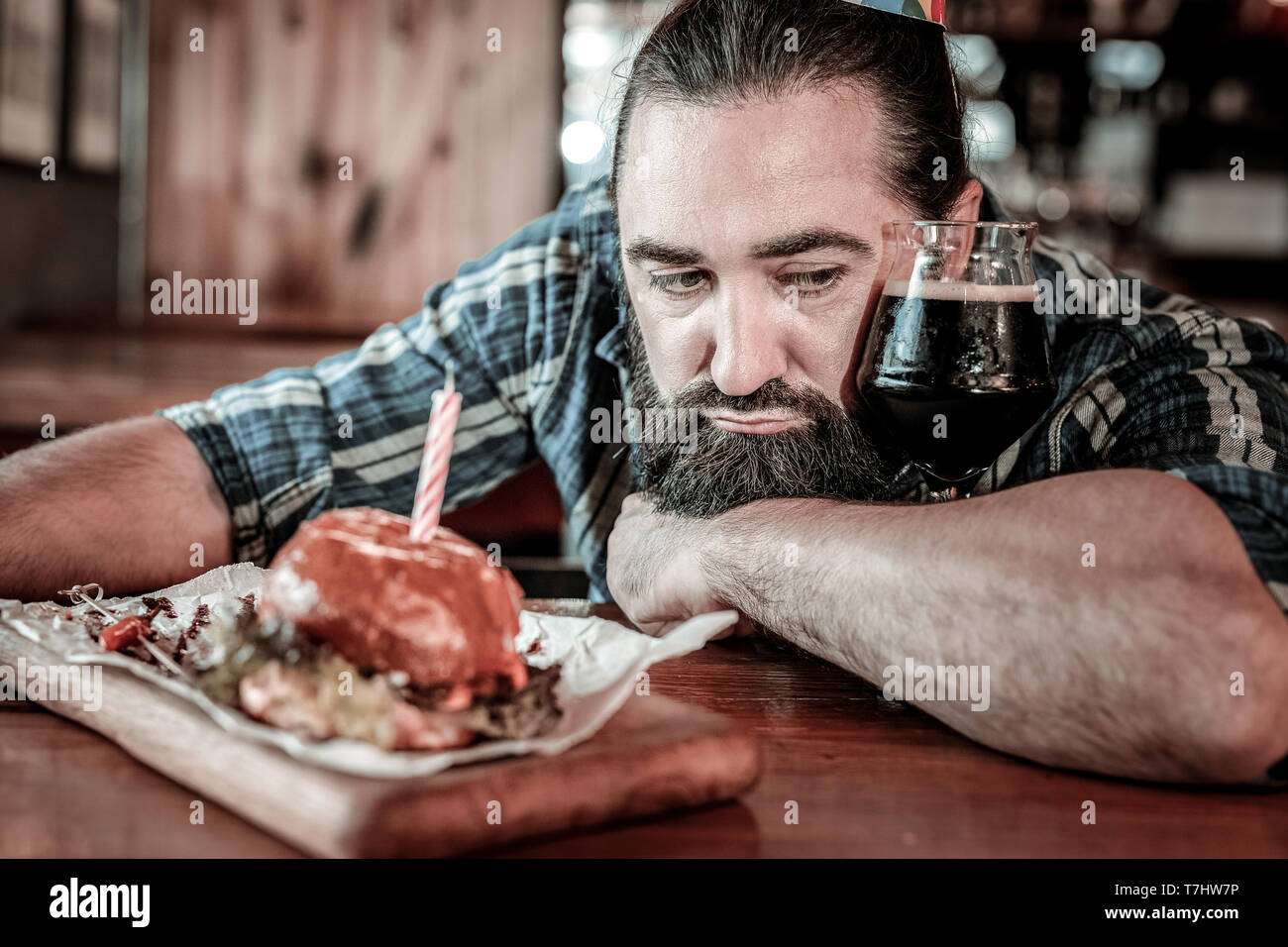 Man resting head on table hi-res stock photography and images - Alamy