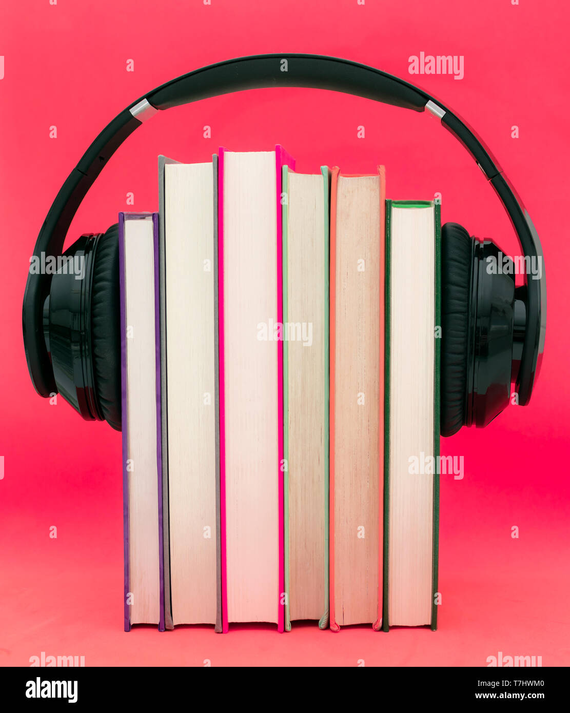 Audiobook concept headphones book hi-res stock photography and images ...
