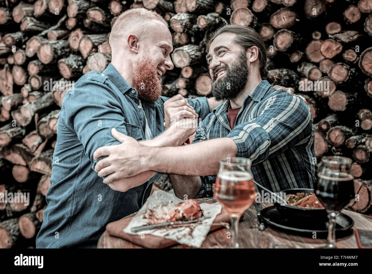 Two friends showing respect to each other Stock Photo - Alamy