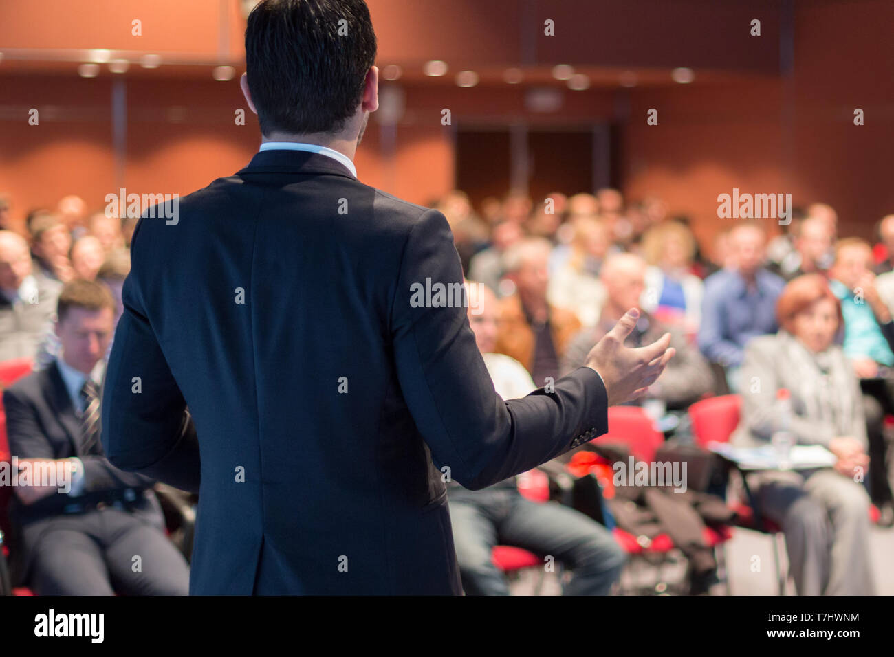Public speaker giving talk at business event Stock Photo - Alamy
