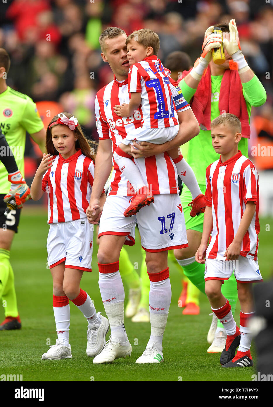 Stoke City's Ryan Shawcross walks out on to the pitch with his family ...