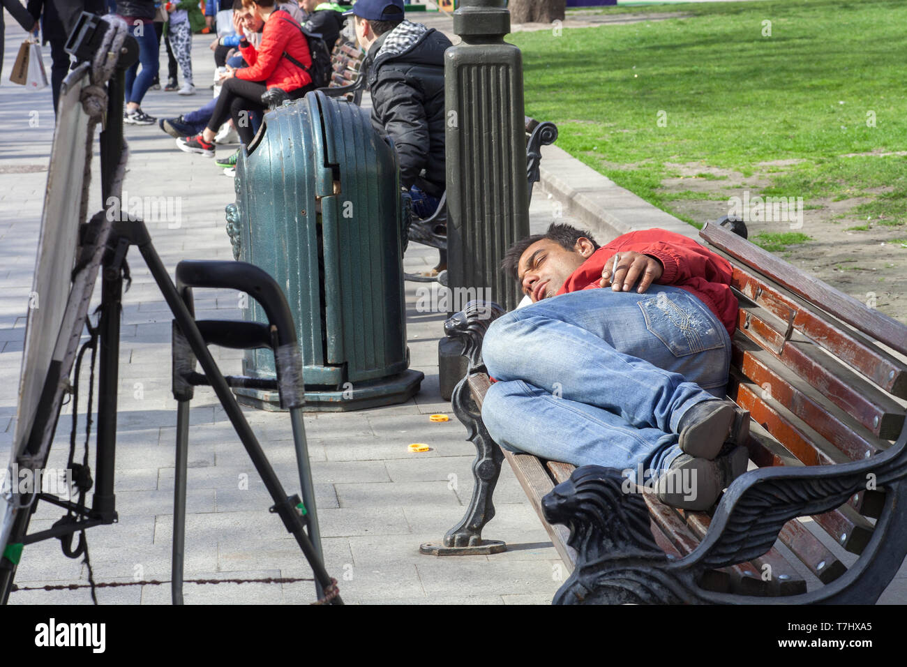 Homeless man smoking cigarette hi-res stock photography and images - Alamy