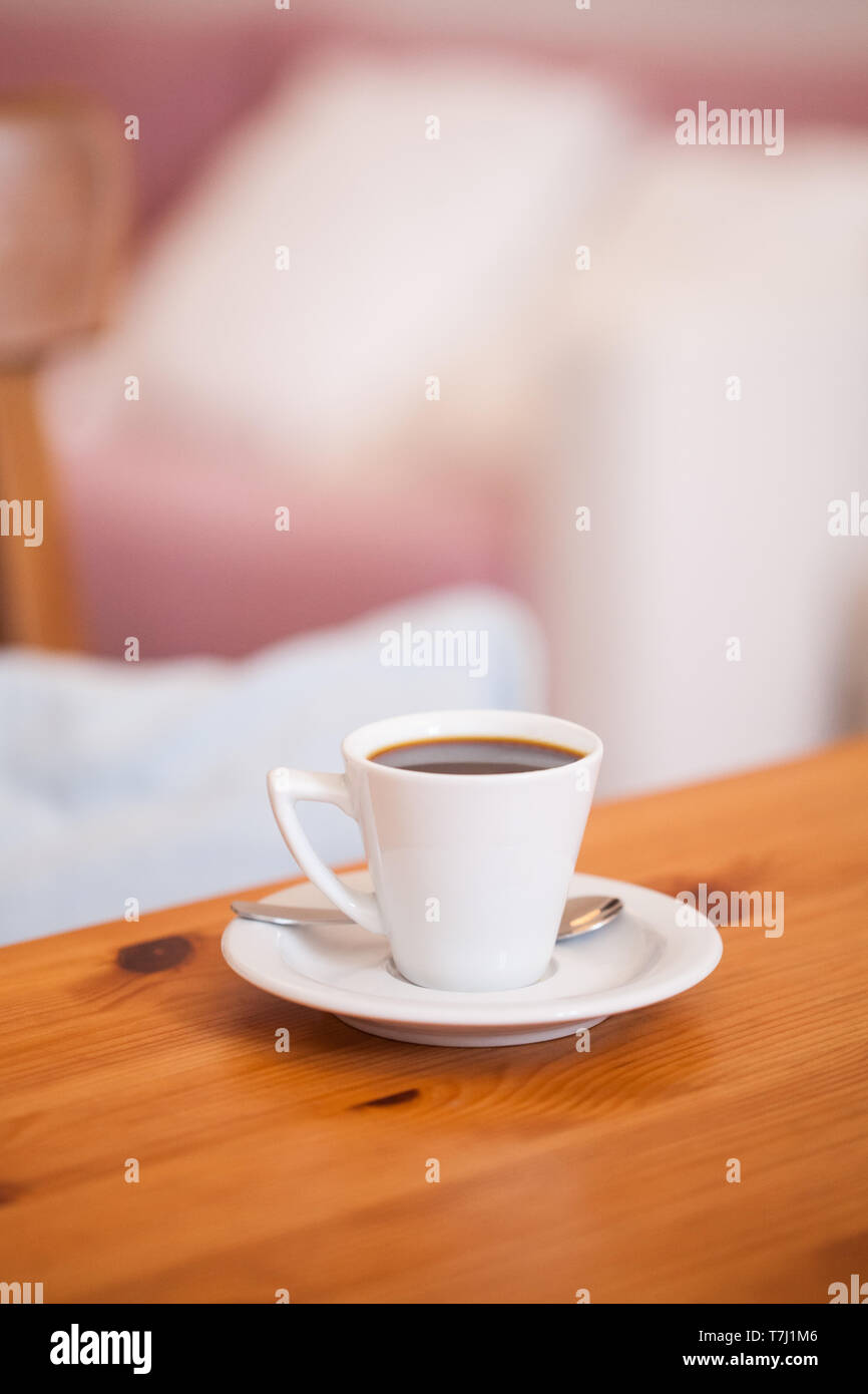 Coffee cup on the table at home Stock Photo - Alamy