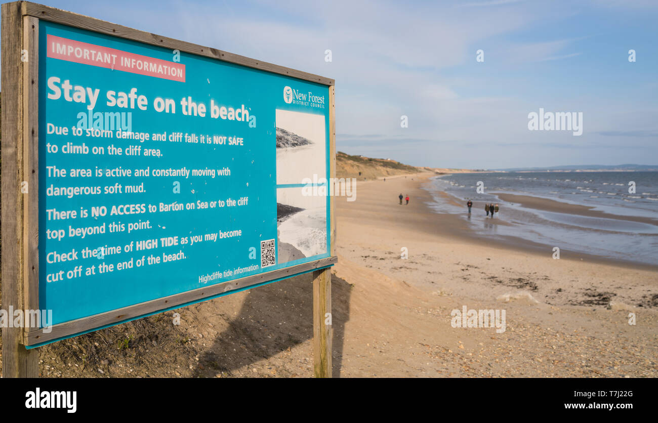 Safety beach sign on the beach in Highcliffe with Isle of Wight in ...