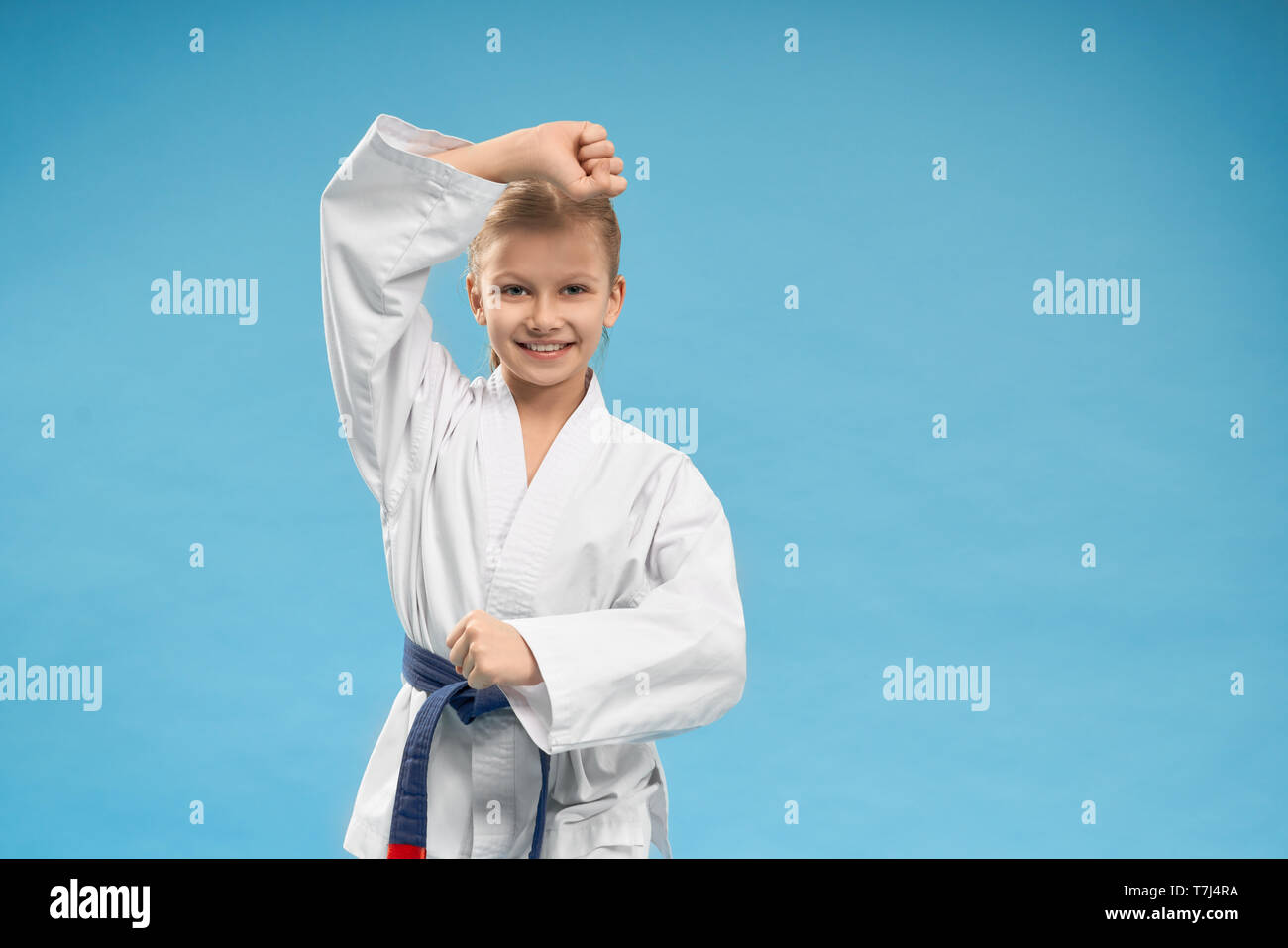 Strong child posing hi-res stock photography and images - Alamy