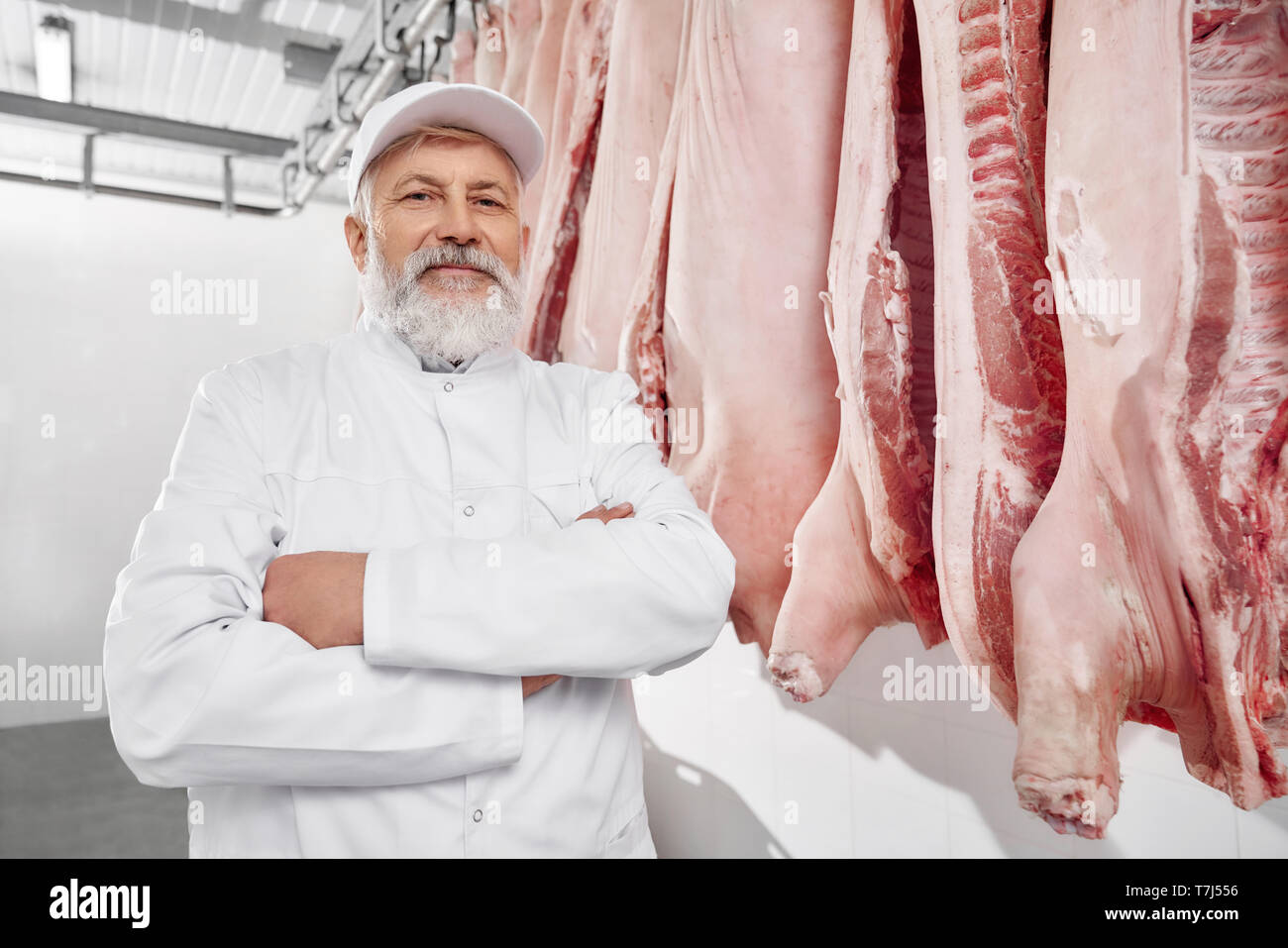 Food manufacturing uniform hi-res stock photography and images - Alamy